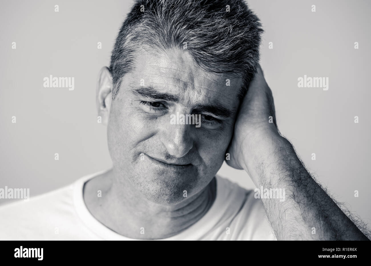 Portrait of an attractive man sad an depressed suffering depression ...