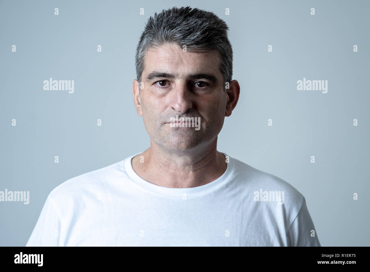 Portrait of an attractive man sad an depressed suffering depression ...