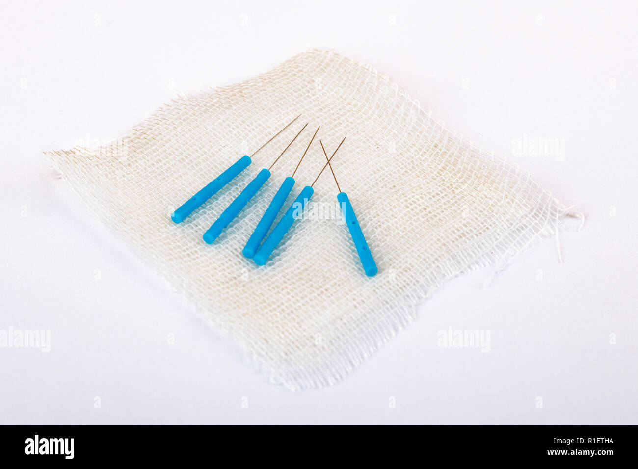 Acupuncture Needles with gauze bandage isolated on white background ...