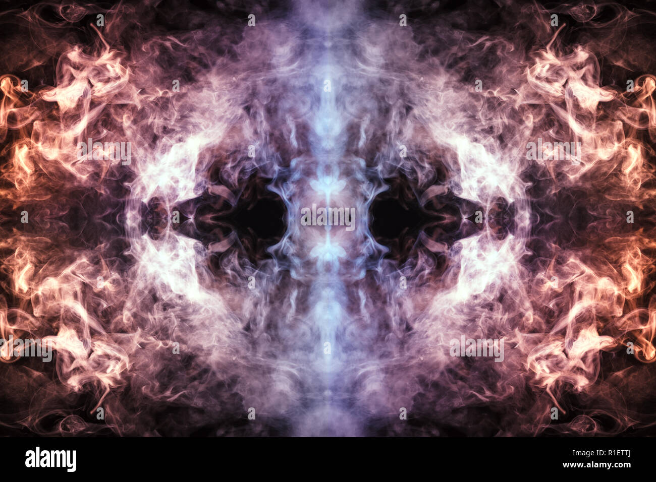 Abstract thick colored smoke on a black background with a monster face ...