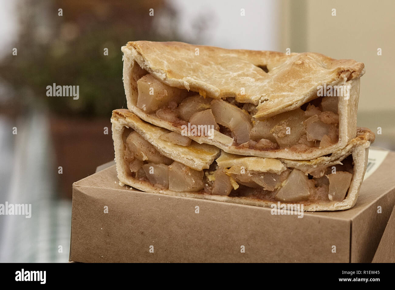 Freshly baked Apple pies on top of cardboard boxes Stock Photo - Alamy