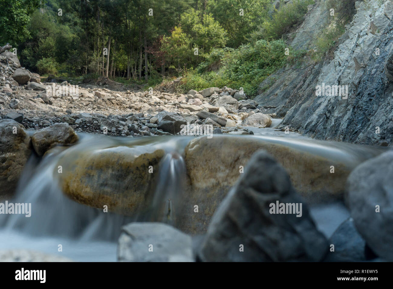 Mountain river with Rapid stream and with bright blurred waves. Big ...