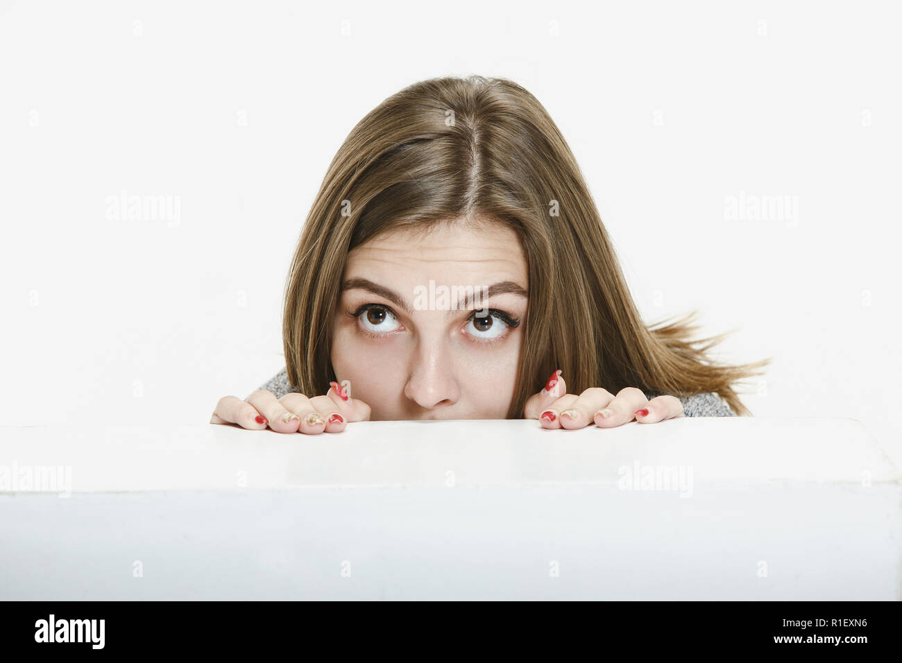 Delight. Beautiful female portrait isolated on white studio backgroud ...