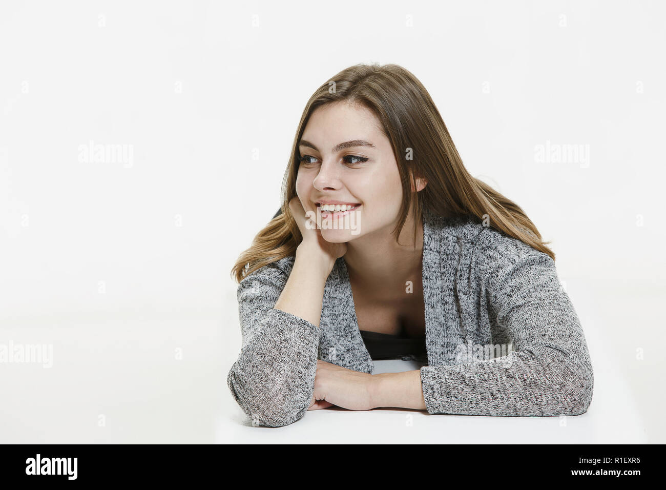 Delight. Beautiful female portrait isolated on white studio backgroud ...