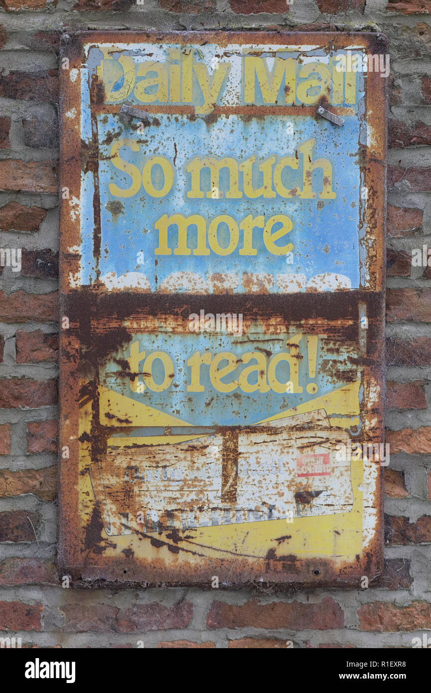 Vintage rusty daily mail sign on a brick wall hi-res stock photography ...