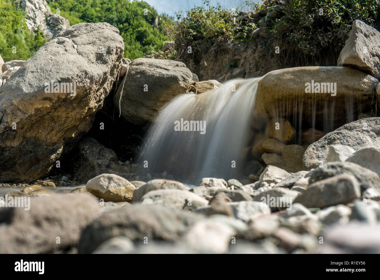 Mountain river with Rapid stream and with bright blurred waves. Big ...