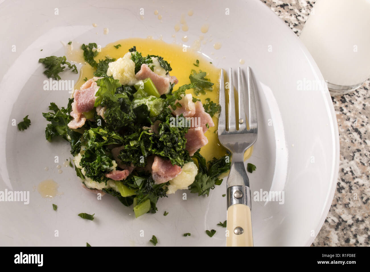 serving a very irish dish colcannon with spring onion, kale, bacon and ...