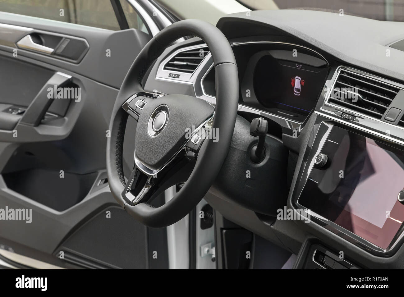 Interior of the car interior with steering wheel and control devices ...