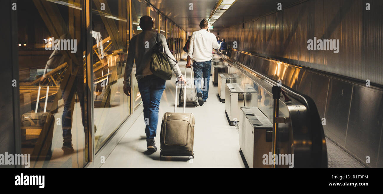 People travelers in the airport ready to flight or just arrived to the ...