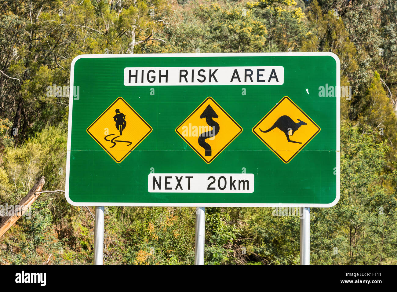 High Risk Area Next 20km Road Sign slippery windy kangaroos Stock Photo ...