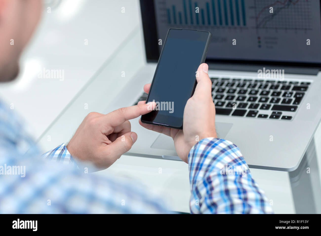 close up.business man looking at the screen of his smartphone Stock ...