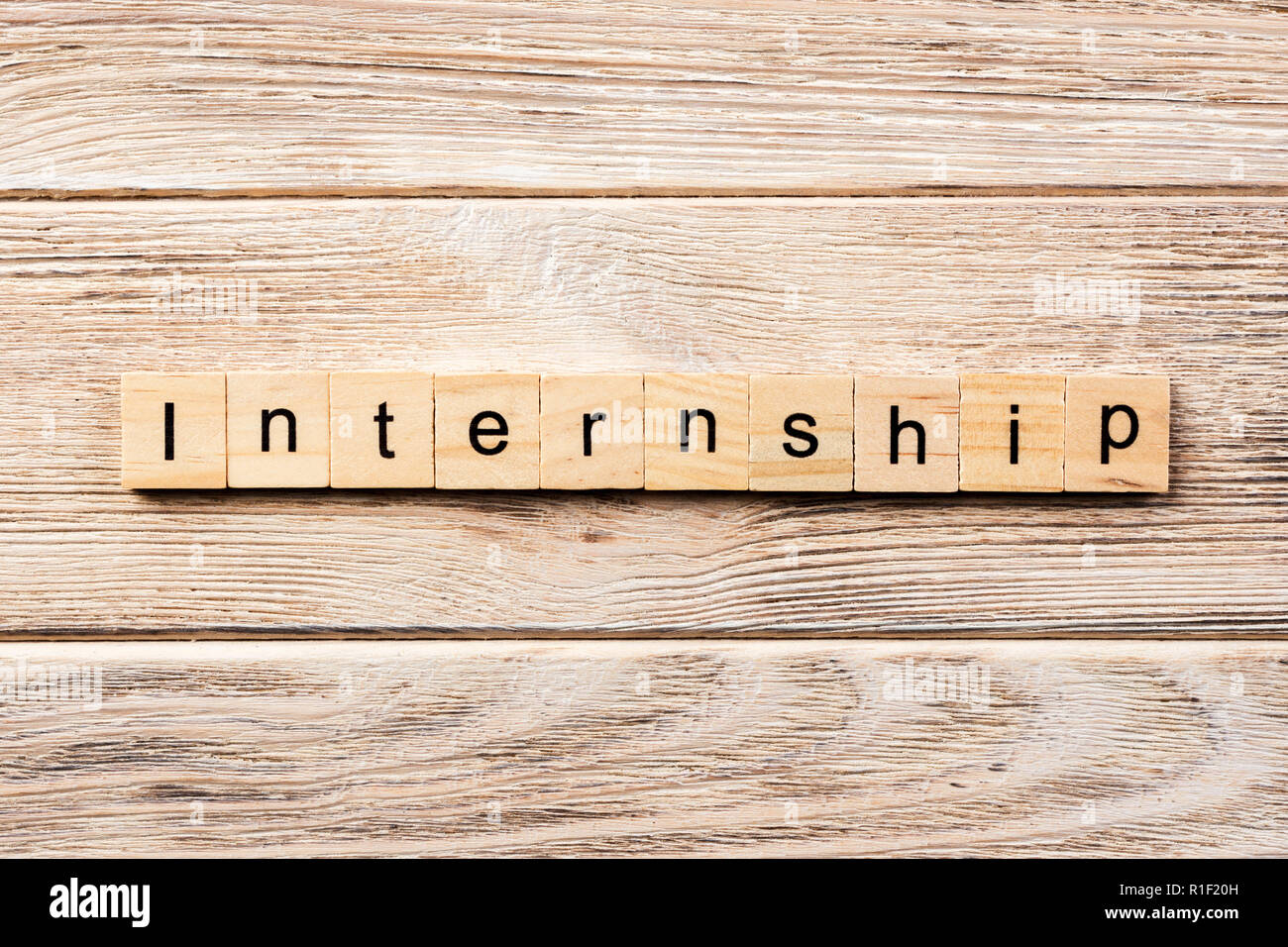 internship word written on wood block. internship text on table ...
