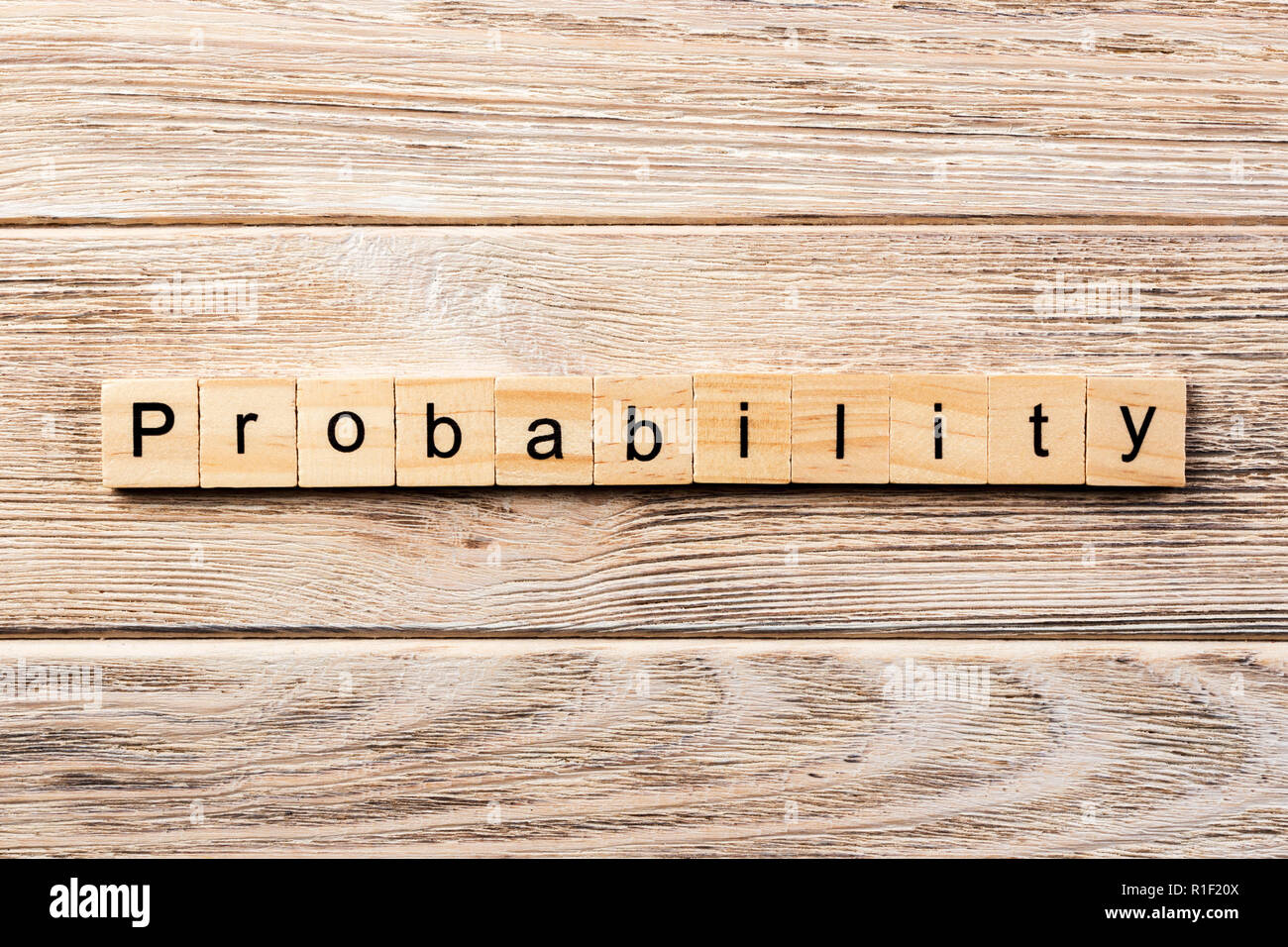 probability word written on wood block. probability text on table ...