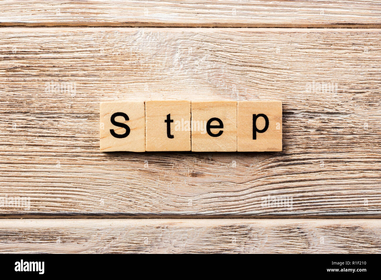 step word written on wood block. step text on table, concept Stock ...