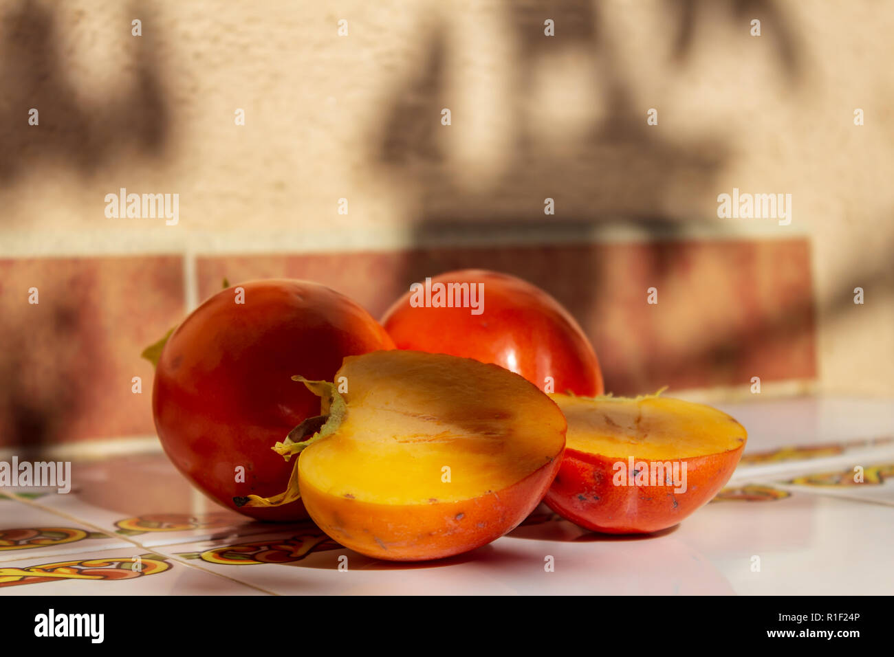 Diospyros kaki, Persimmon Fruit, ripe and ready to eat Stock Photo - Alamy