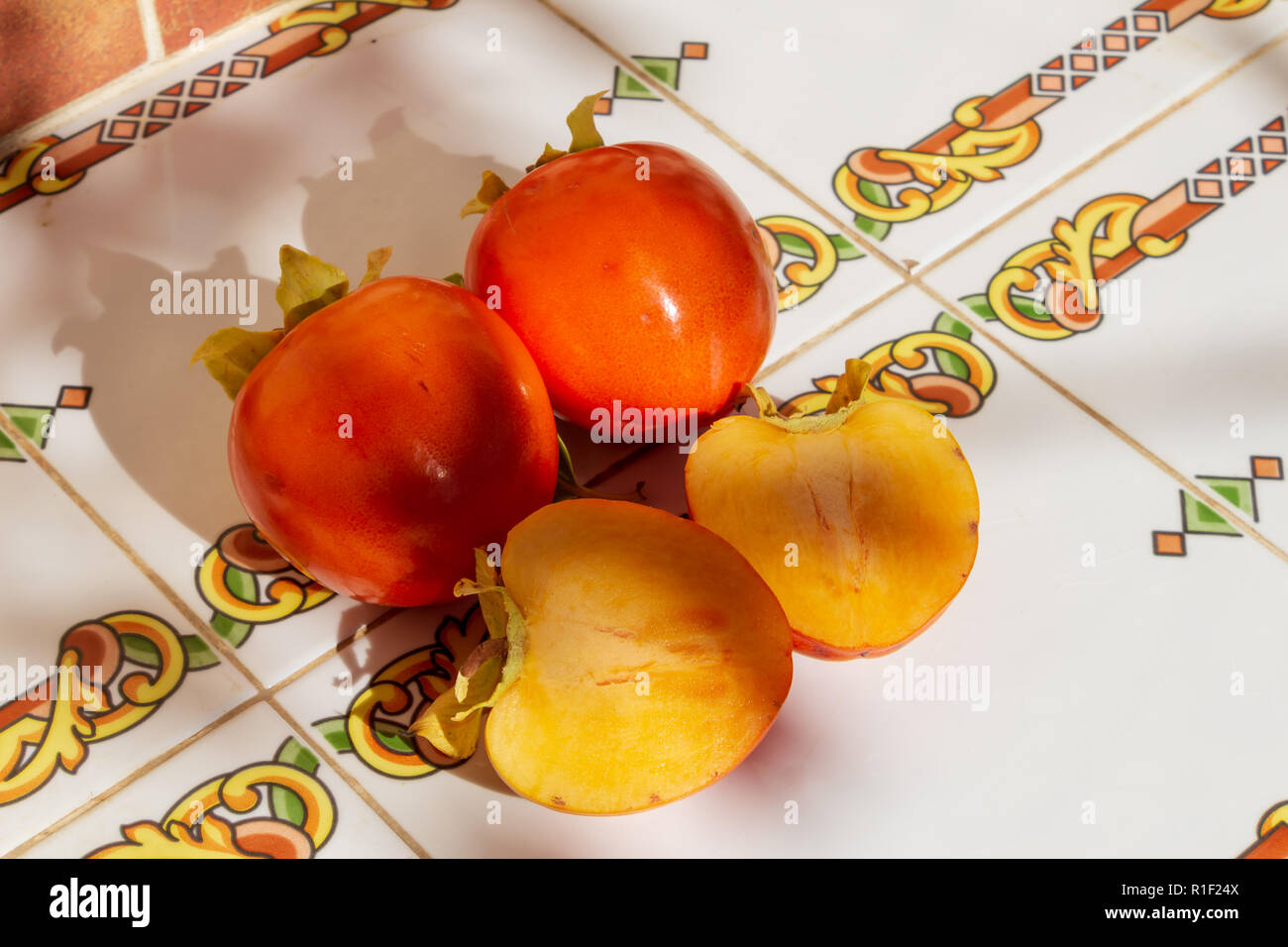 Diospyros kaki, Persimmon Fruit, ripe and ready to eat Stock Photo - Alamy