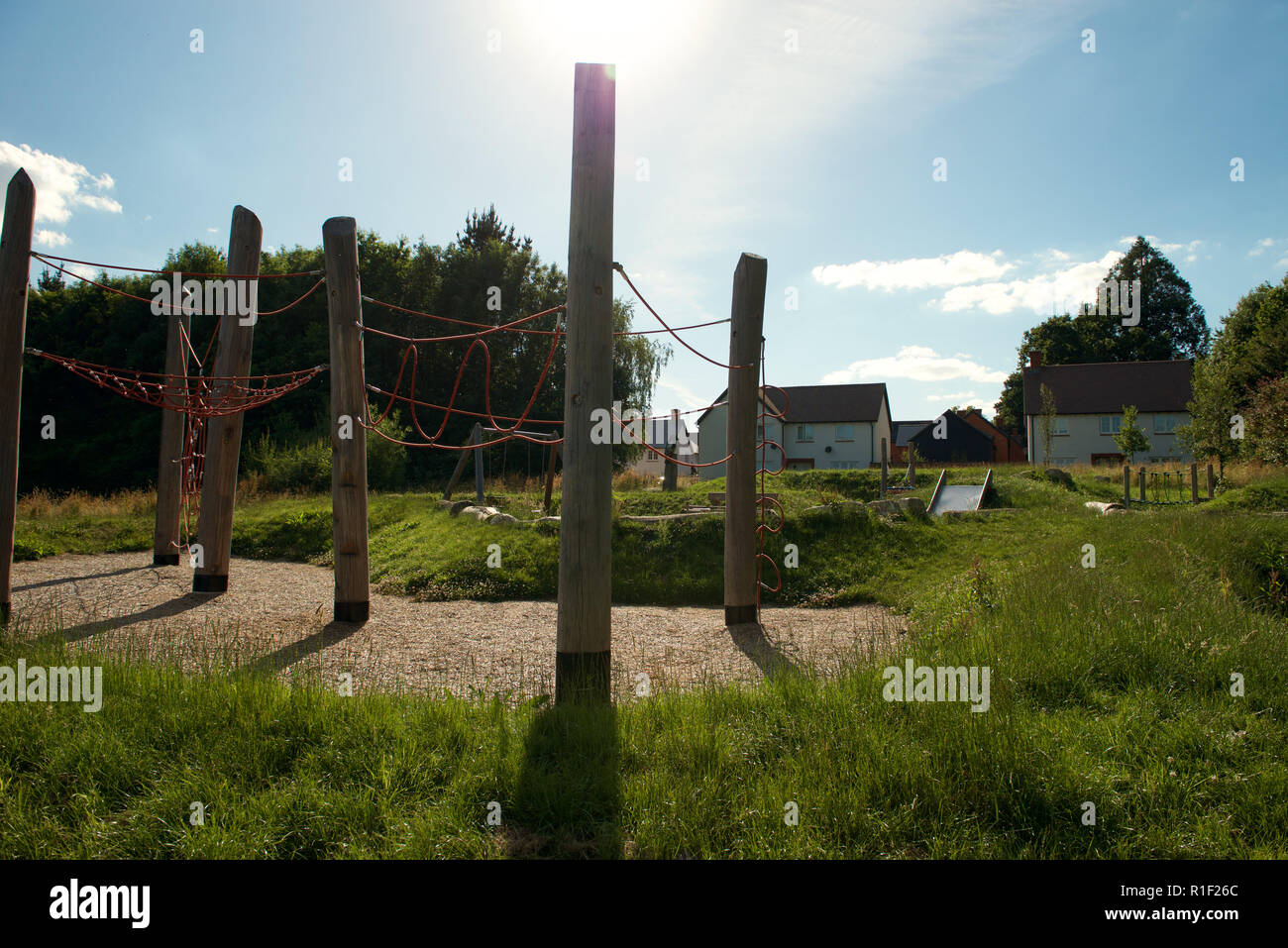 Urban development with eco communal play area Stock Photo - Alamy