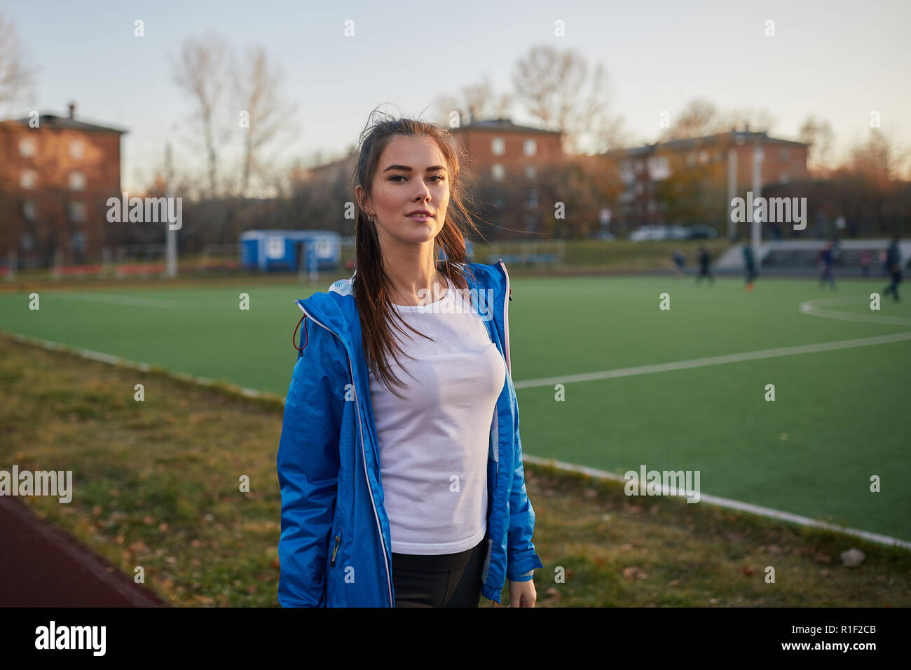Young athletic girl trains at the stadium Stock Photo - Alamy