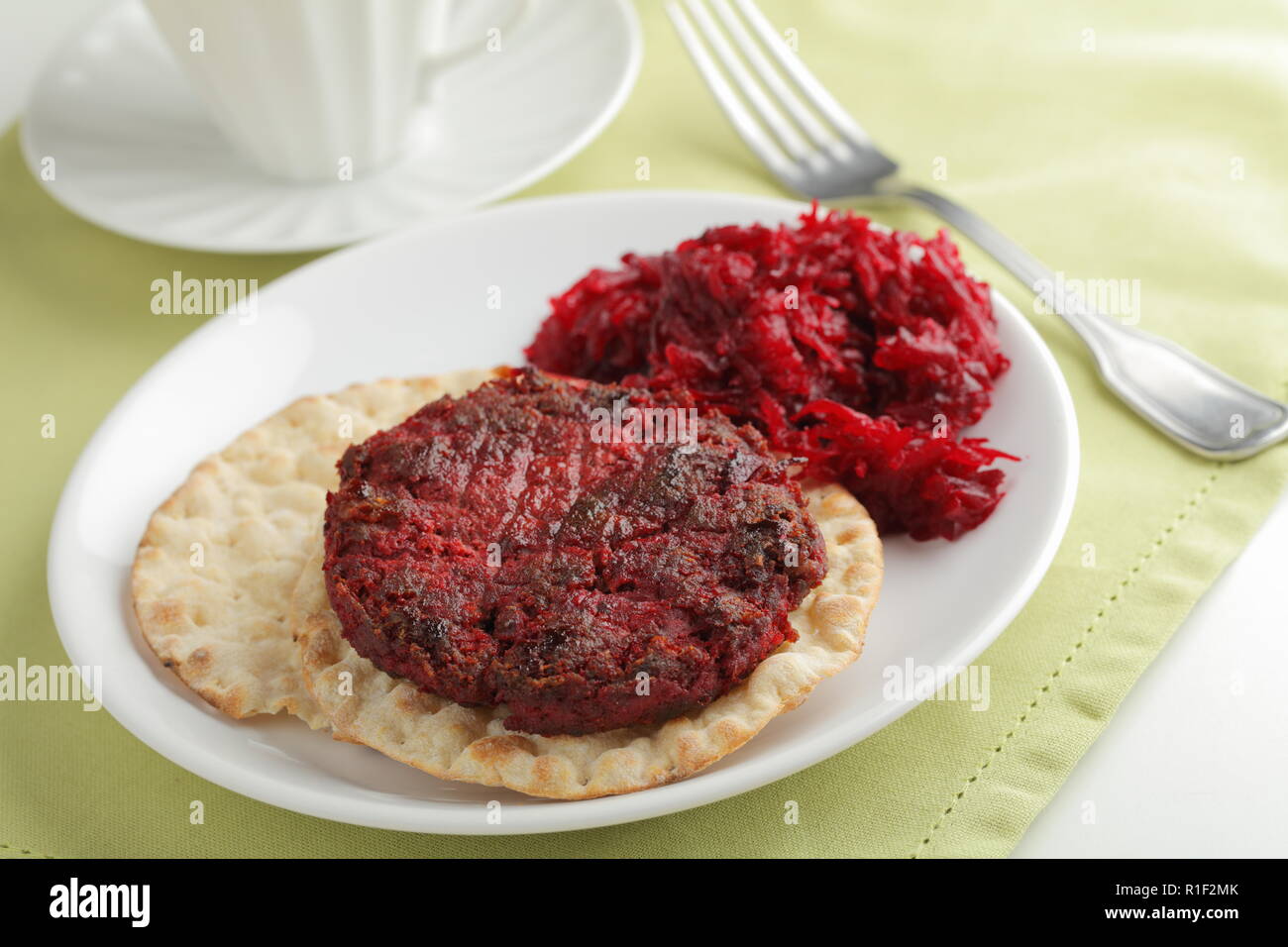 Swedish beef burger Biff a la Lindstrom with crusty bread and beetroot ...