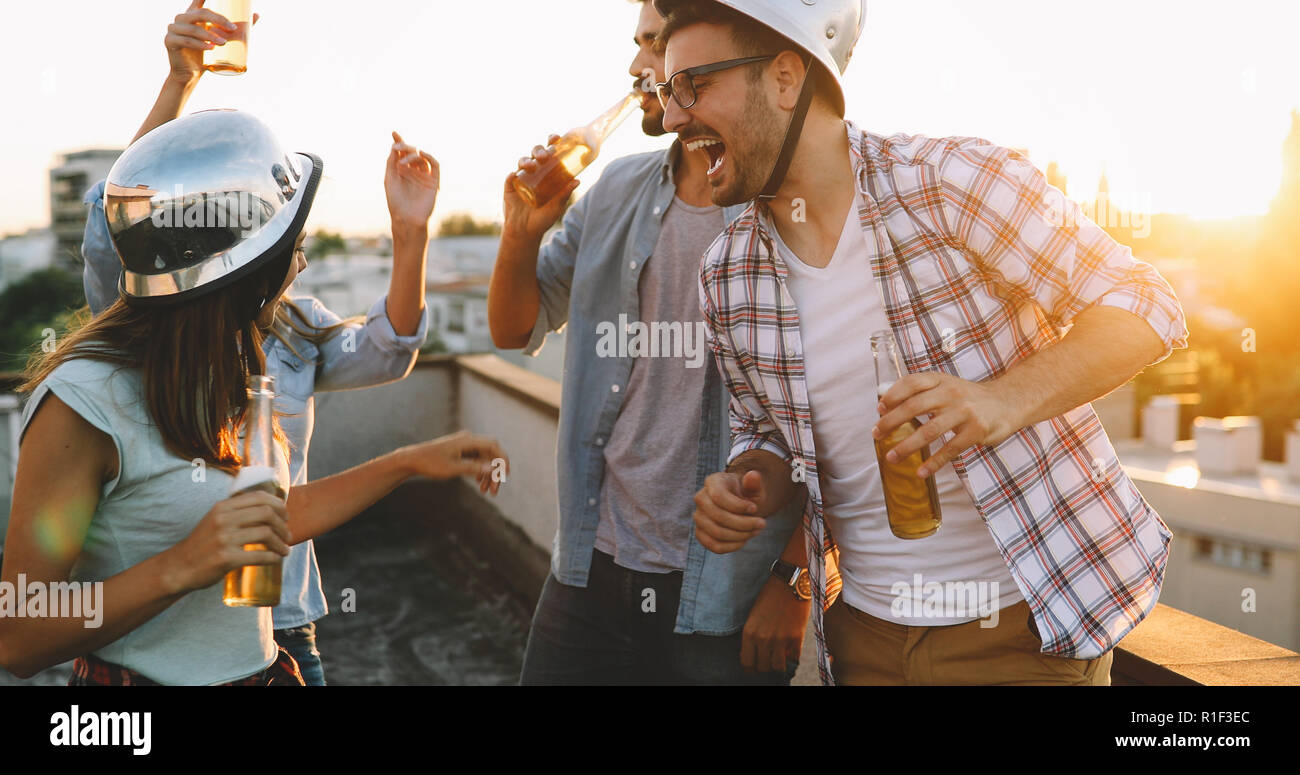 Happy cheerful friends spending fun times together Stock Photo - Alamy