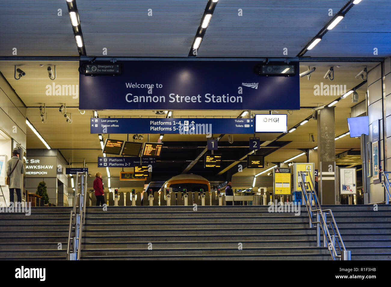 Cannon Street Station entrance with railway trains and very few ...