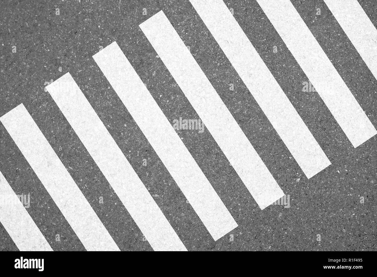 Zebra crosswalk on the road for safety when people walking cross the ...