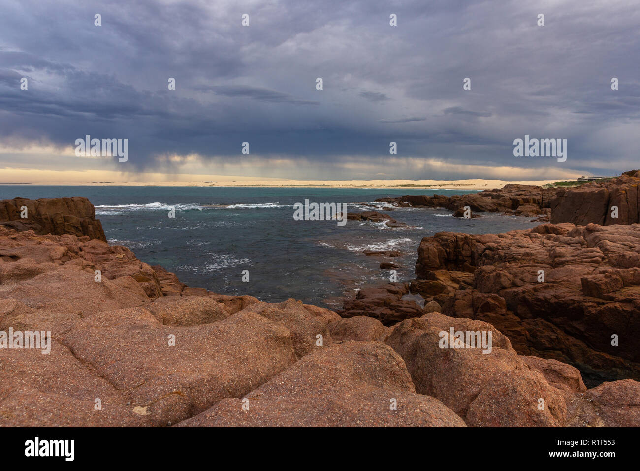 seascape Anna Bay beach in morning with sunrise sky and dramatic strom ...