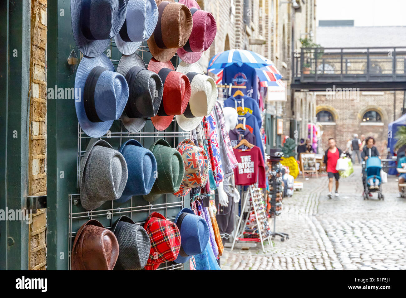 Assorted hats on display at Camden Market in London Stock Photo - Alamy