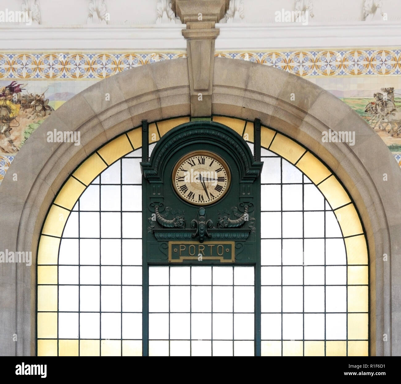 Beautiful old clock in the train station of S.Bento in Porto, Portugal ...