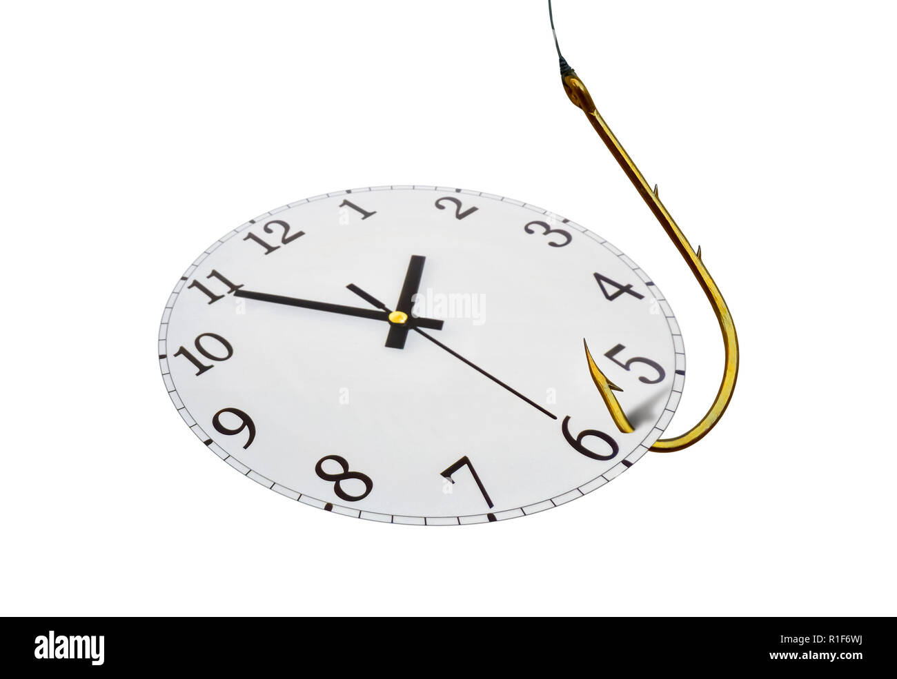 Clock and fishing hook isolated on white background Stock Photo - Alamy