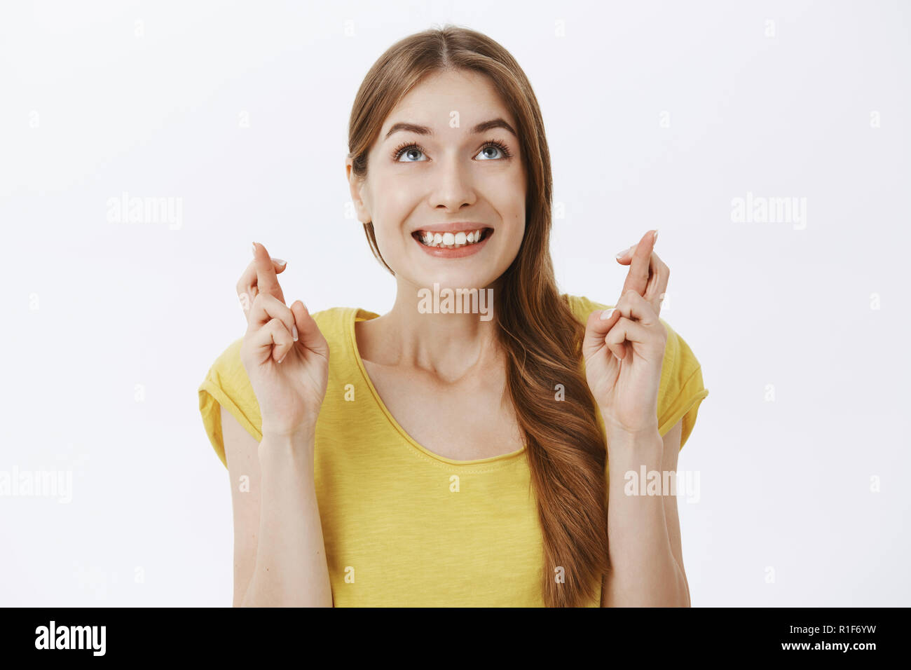 Dreamy hopeful and optimistic cute charismatic woman with braid in ...