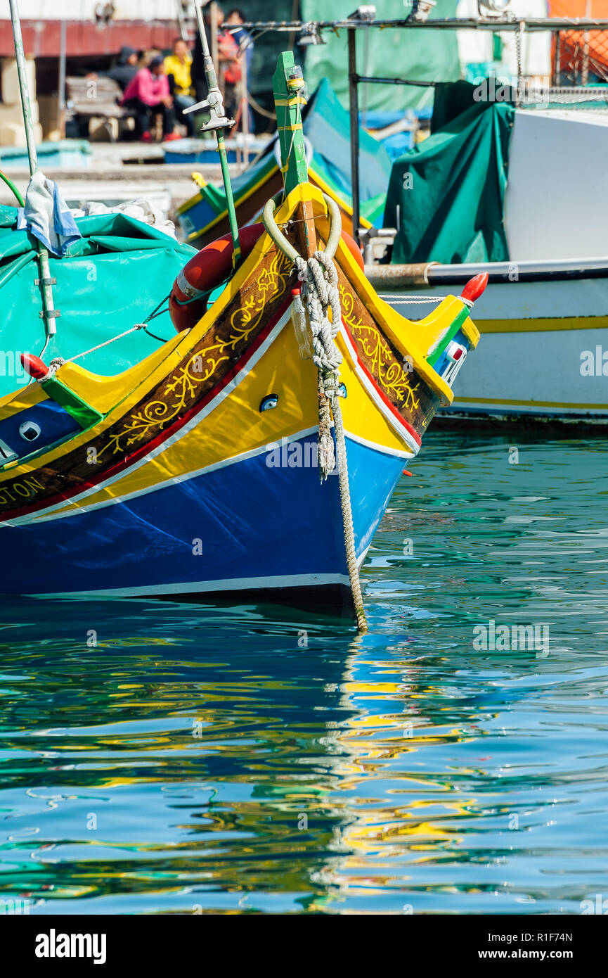 Traditional Maltese luzzu in the Marsaxlokk harbour Stock Photo - Alamy