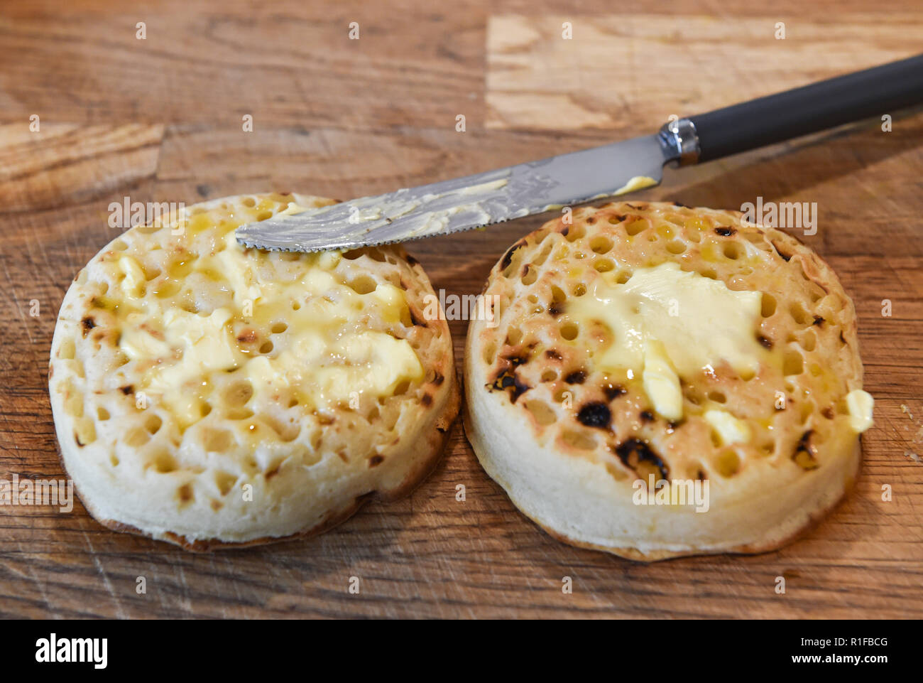 Buttered toasted crumpets hi-res stock photography and images - Alamy