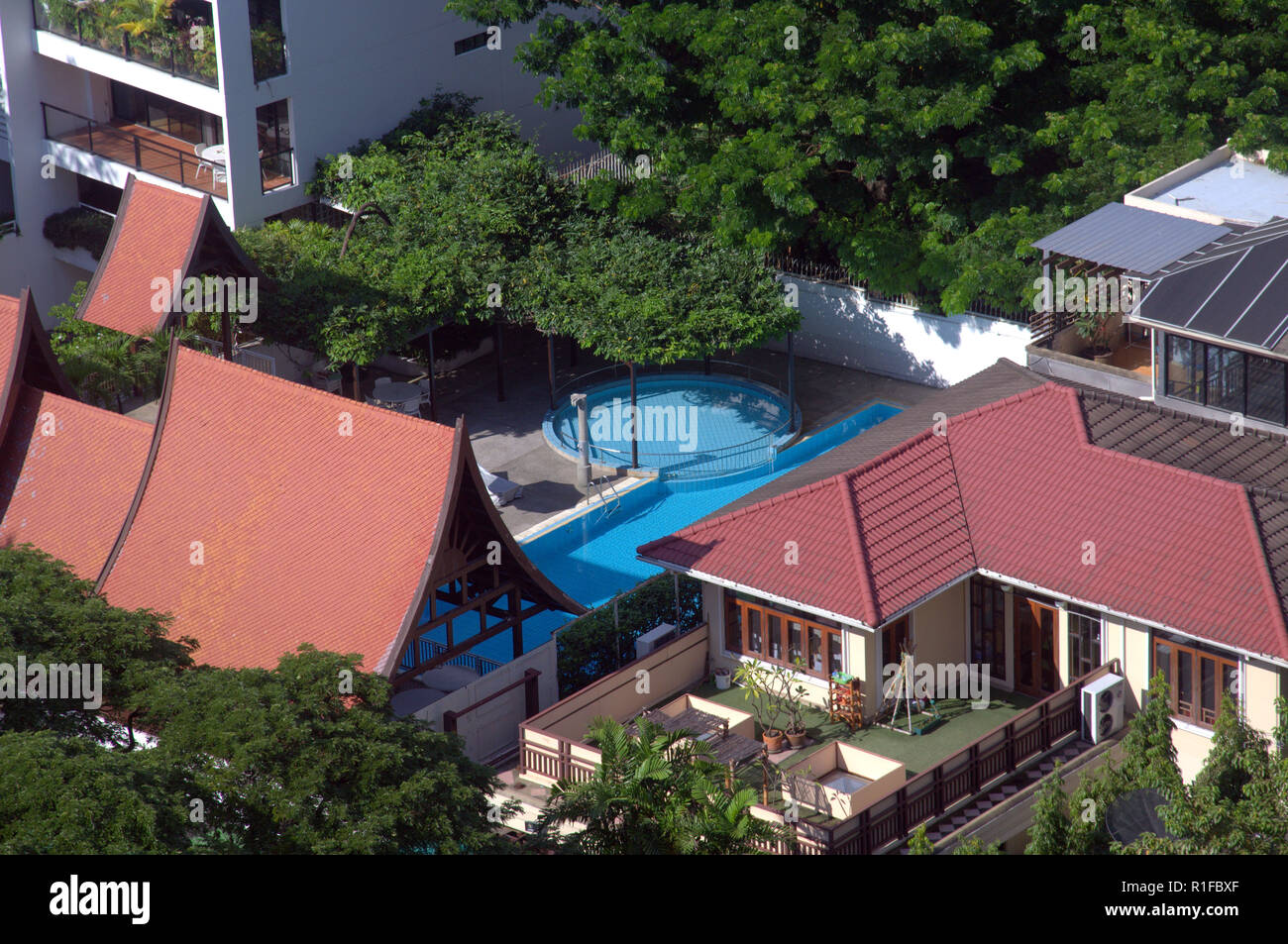 Overhead view of houses and swimming pool in Bangkok, Thailand Stock ...