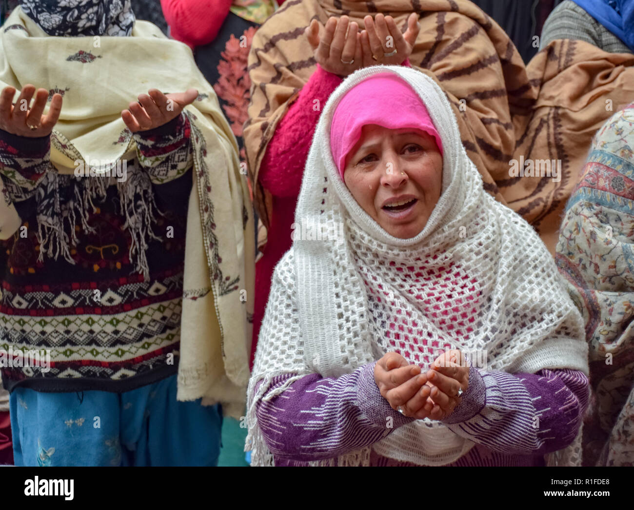 A Kashmiri Muslim woman seen weeping during the mass prayers at the ...