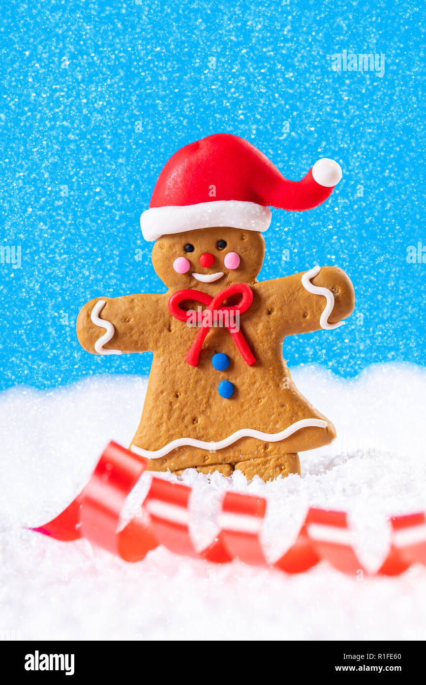 ginger man in the snow, festive background Stock Photo - Alamy