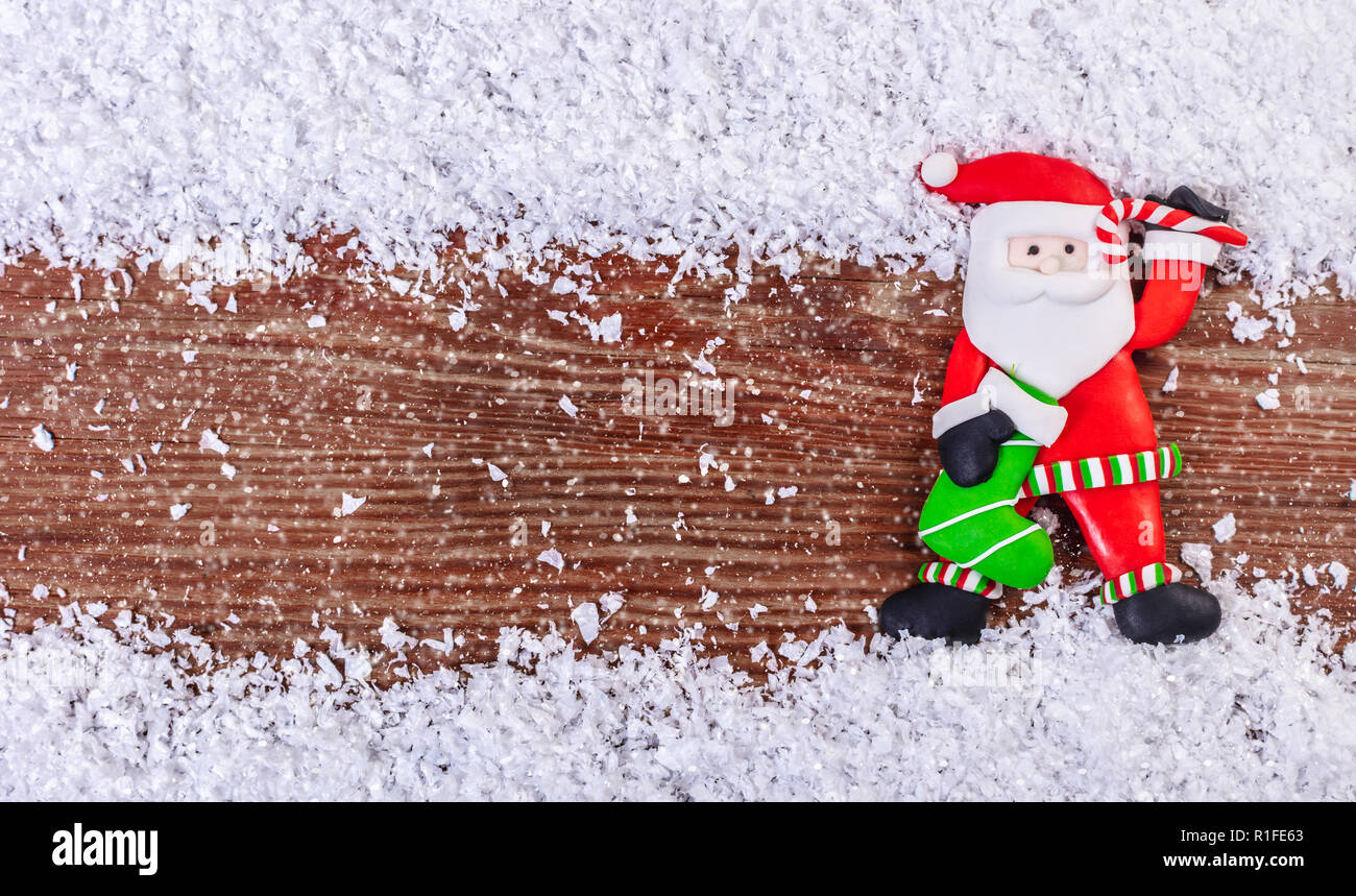santa claus in the snow, festive background Stock Photo - Alamy