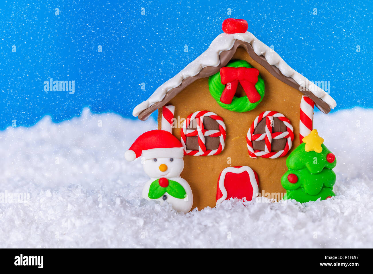 ginger house in the snow, festive background Stock Photo - Alamy