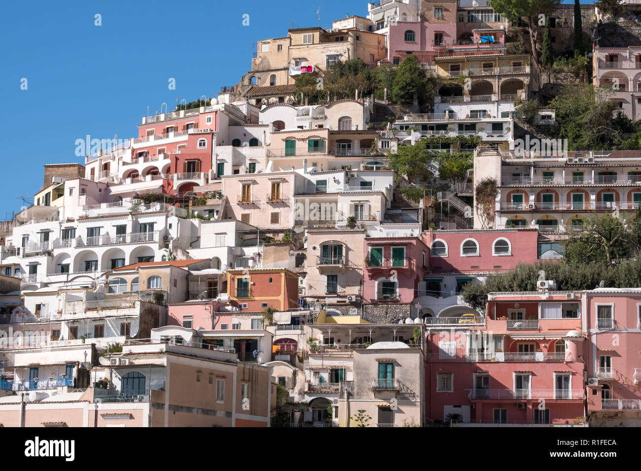 Colourful houses on the mountain side in the delightful town of ...