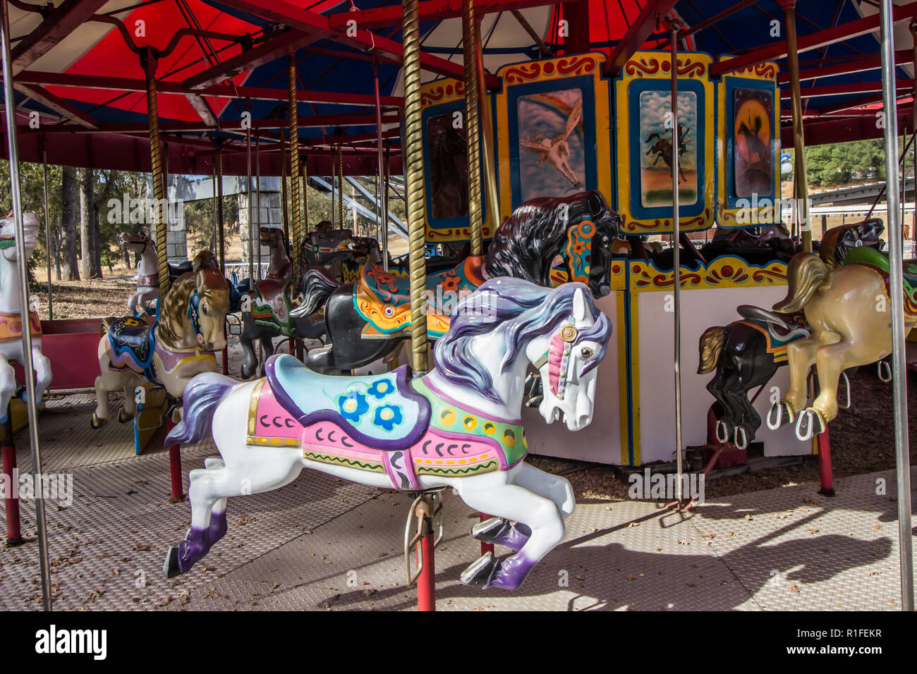 Merry go round horses hi-res stock photography and images - Alamy