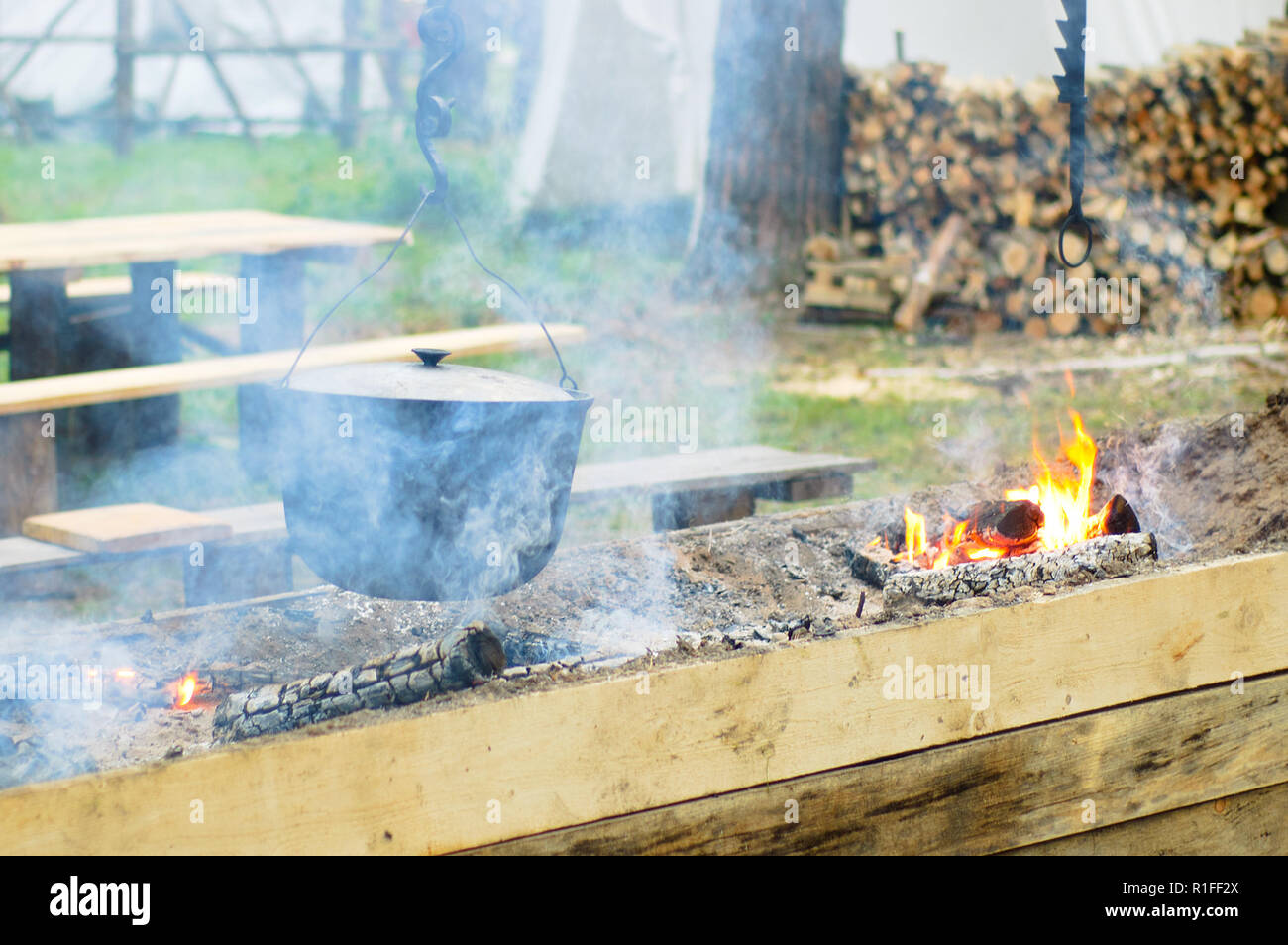Cooking kettle fire on wooden hi-res stock photography and images - Alamy