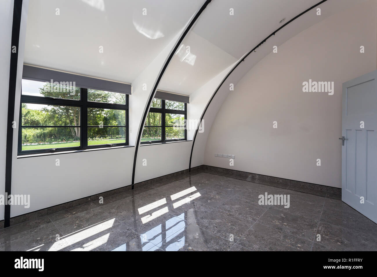 War time Nissen hut conversion by pascott.co.uk Stock Photo - Alamy