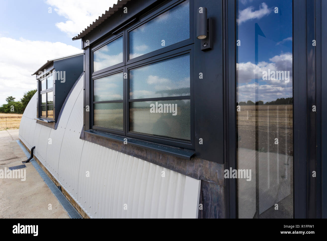 War time Nissen hut conversion by pascott.co.uk Stock Photo - Alamy