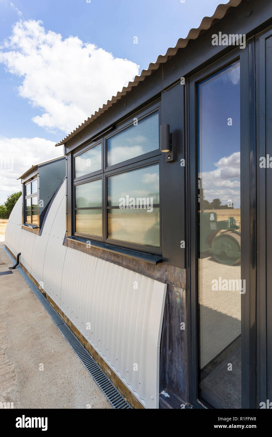 War time Nissen hut conversion by pascott.co.uk Stock Photo - Alamy