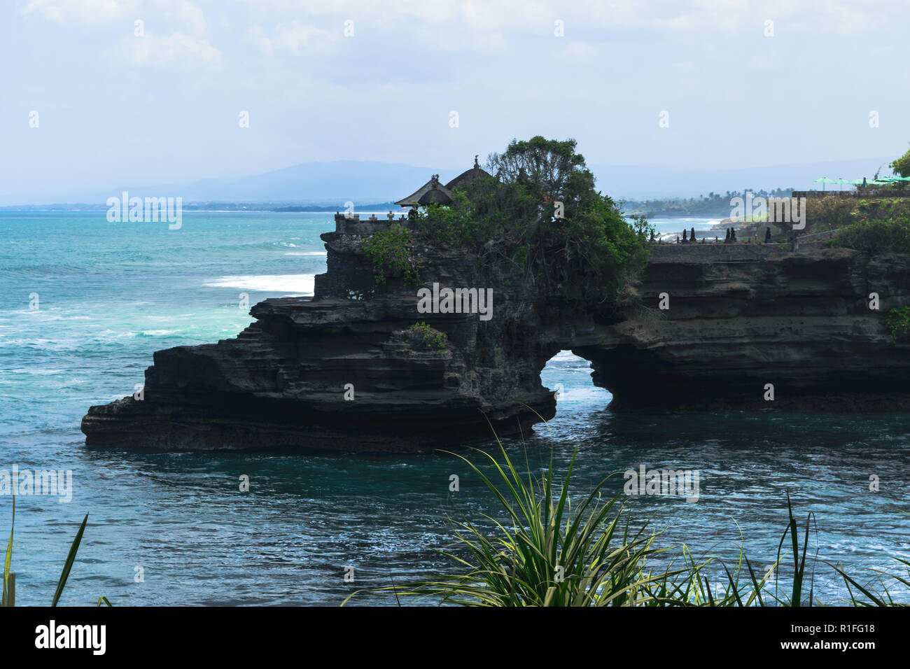 Landscape of Bali island shore with dark blue Indian ocean, huge waves ...