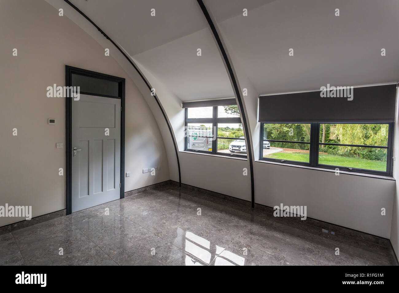 War time Nissen hut conversion by pascott.co.uk Stock Photo - Alamy