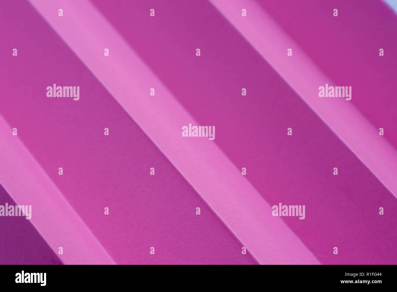 violet sheet of paper folded background texture Stock Photo - Alamy