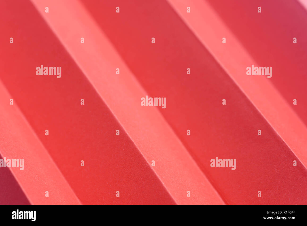 red sheet of paper folded background texture Stock Photo - Alamy