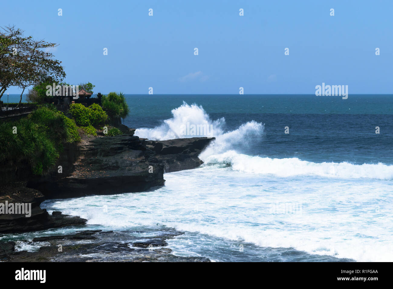 Landscape of huge white Indian ocean wave splash to to the cliff in ...
