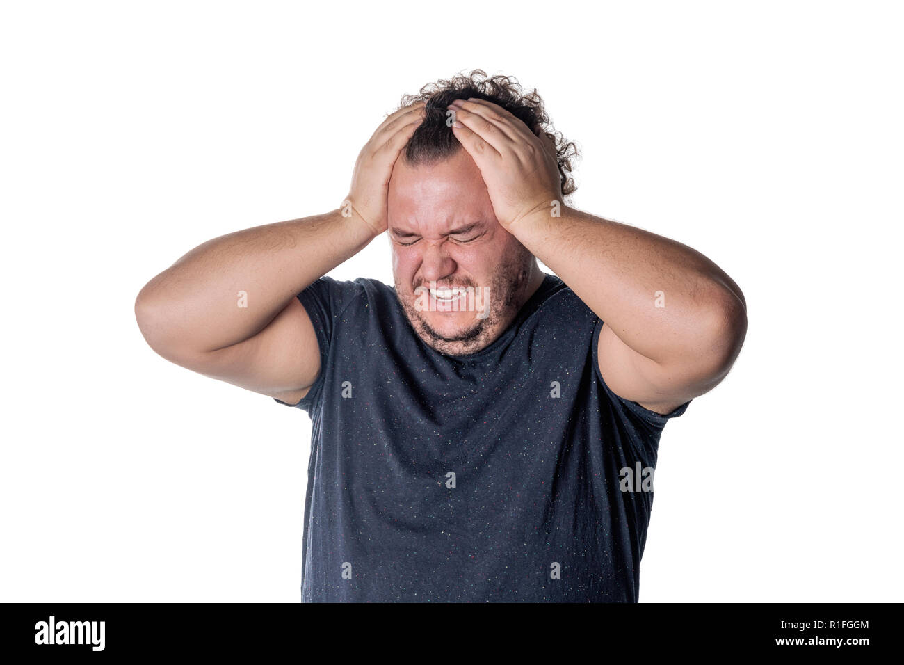 A fat man has high blood pressure and headache Stock Photo - Alamy